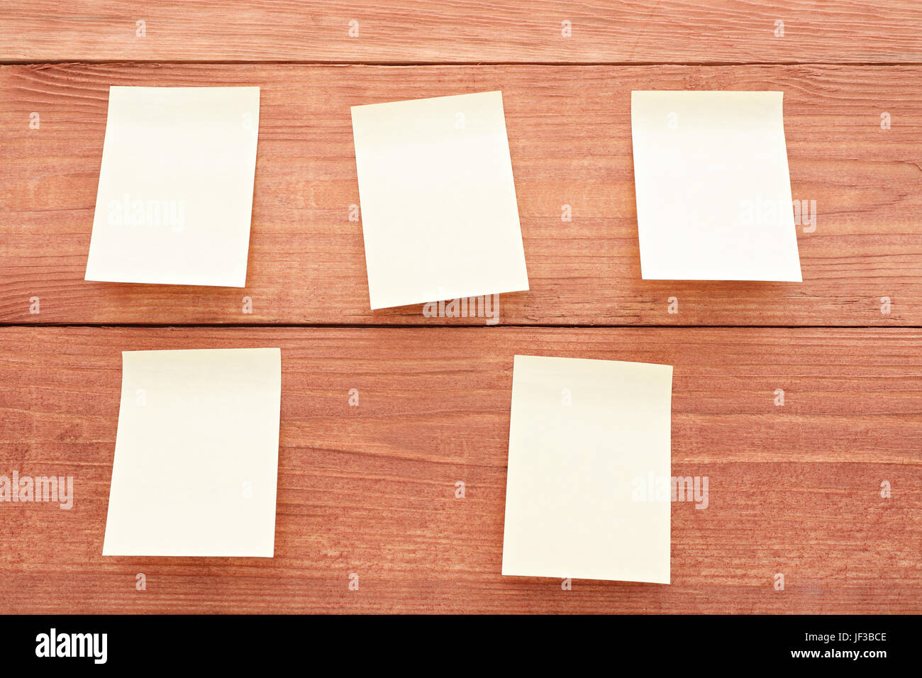 Five stickers on wood background Stock Photo - Alamy
