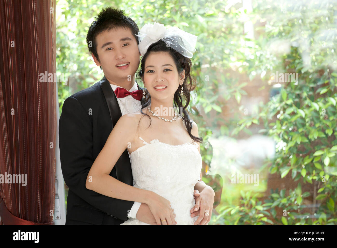 portrait of couples of asian groom and bride in wedding suit Stock ...