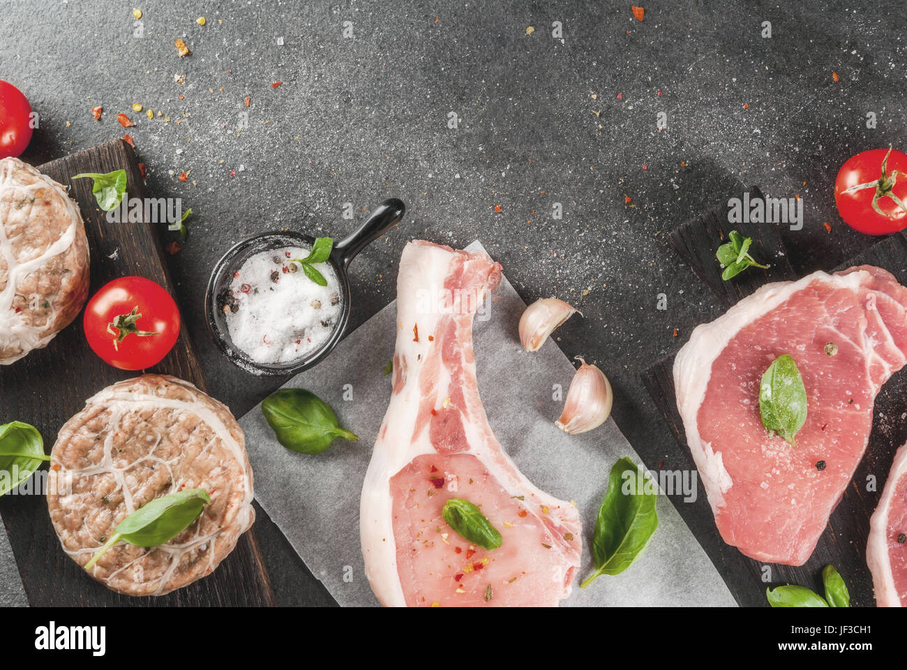 Raw organic meat. Selection of several types of red meat: pork cutlet ...