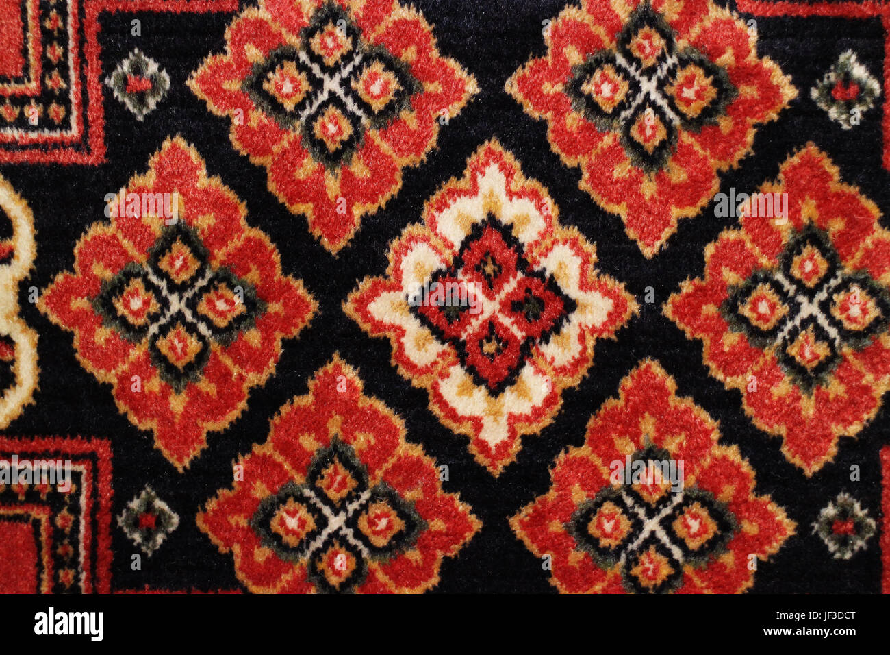 pattern on woolen carpets Stock Photo - Alamy
