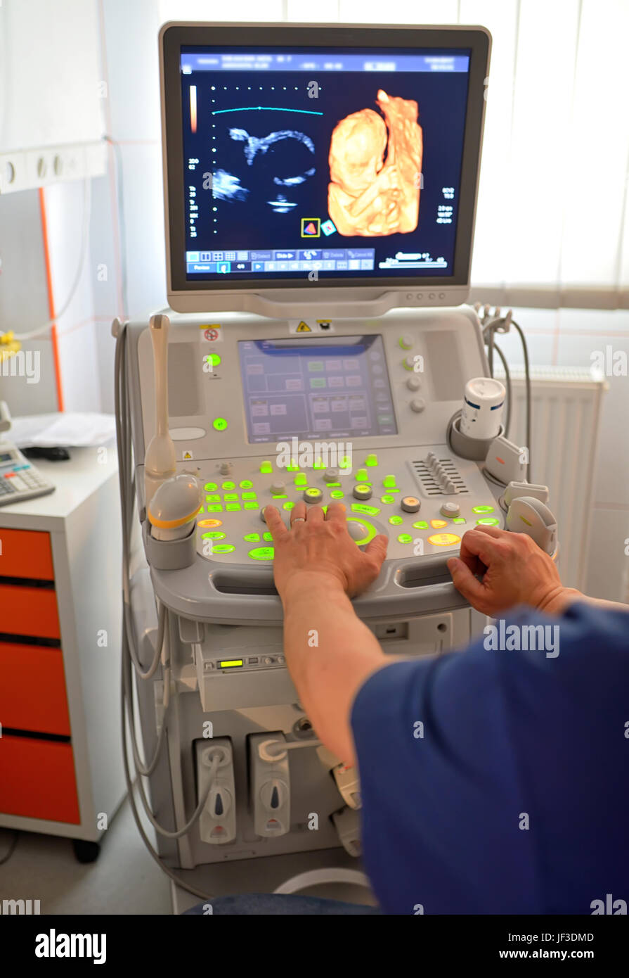 Doctor Examining Pregnant Belly By Ultrasonic Scan Stock Photo - Alamy