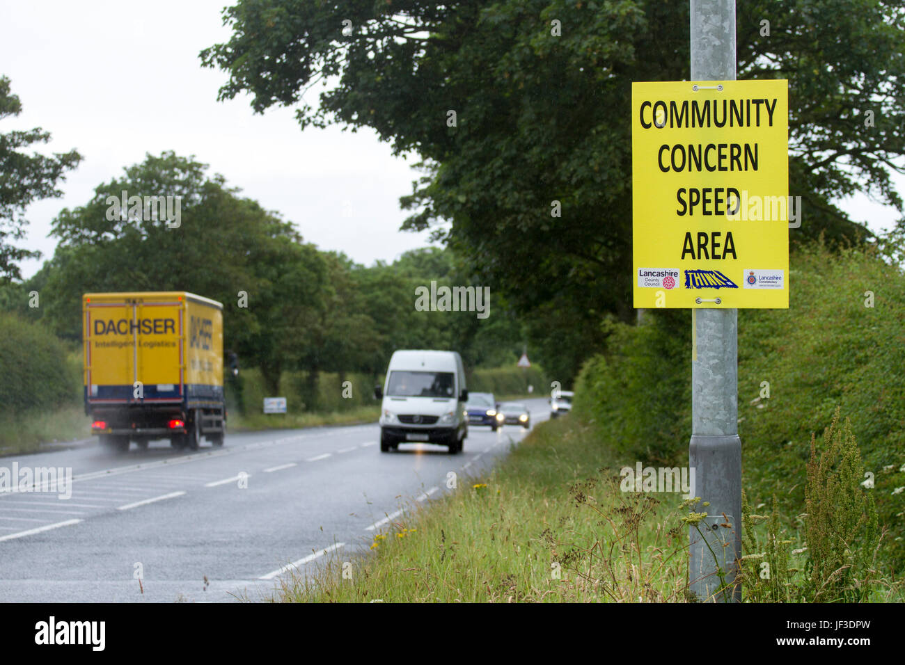 a uk road speed check slow down warning sign signs restrict ...