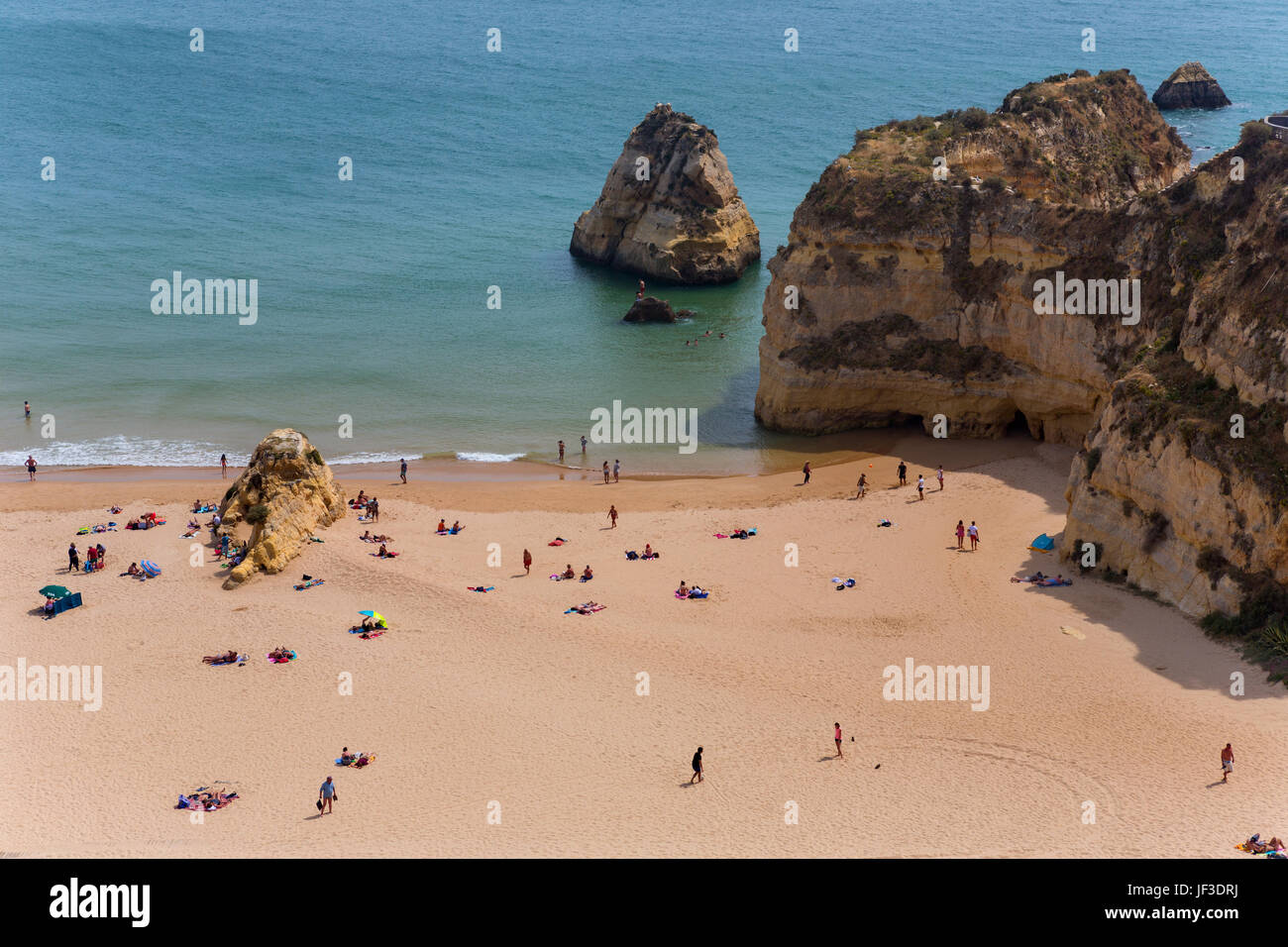 PRAIA DA ROCHA, PORTUGAL - APRIL 25, 2017: People at the famous beach ...