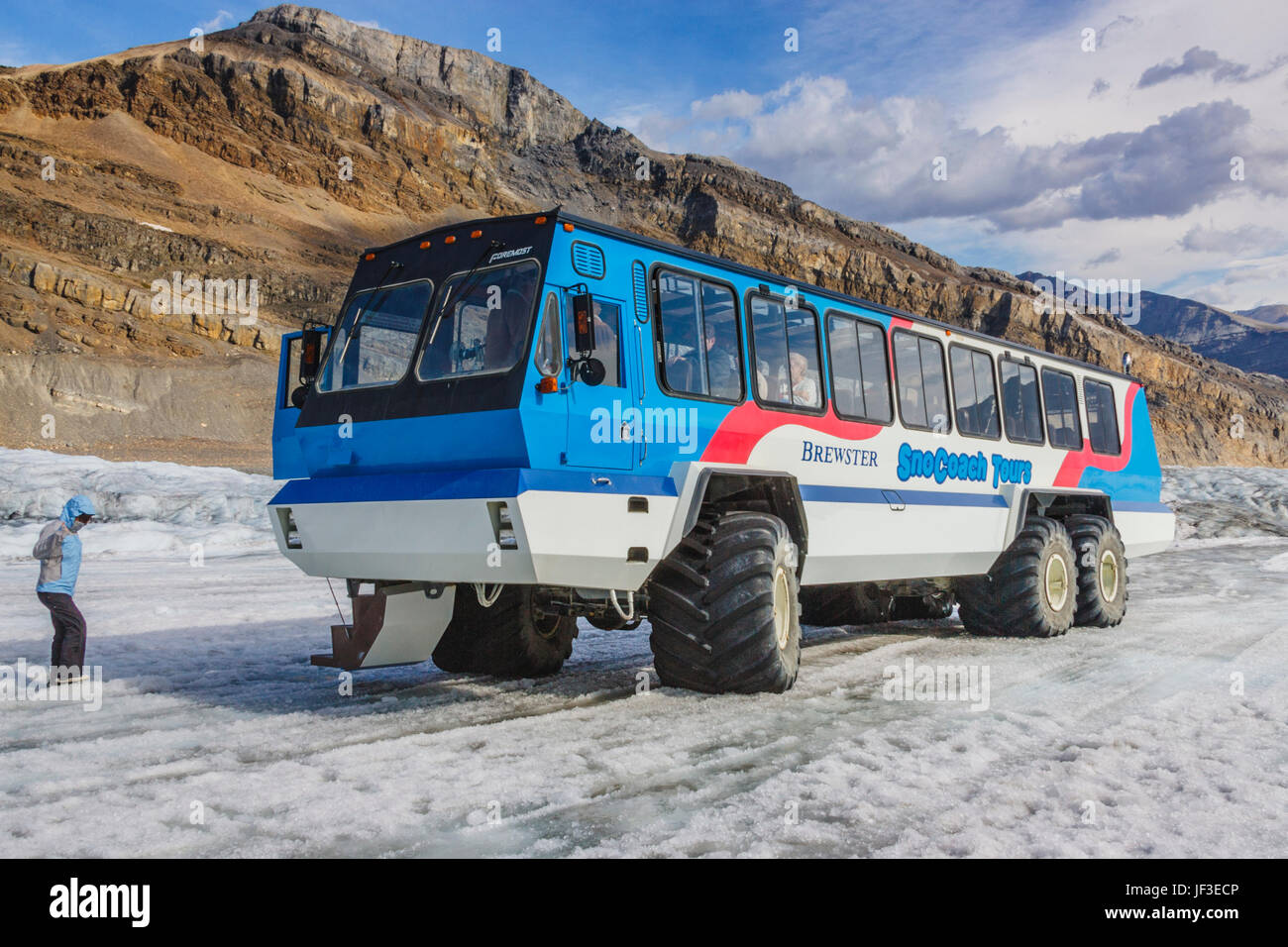 Snow Coach tour bus at the Athabasca Glacier. The Athabasca is the most ...