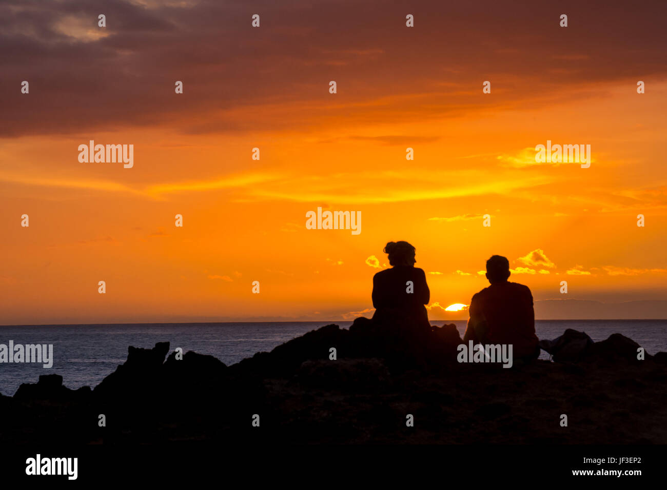 Sun Setting on the Ocean Stock Photo - Alamy
