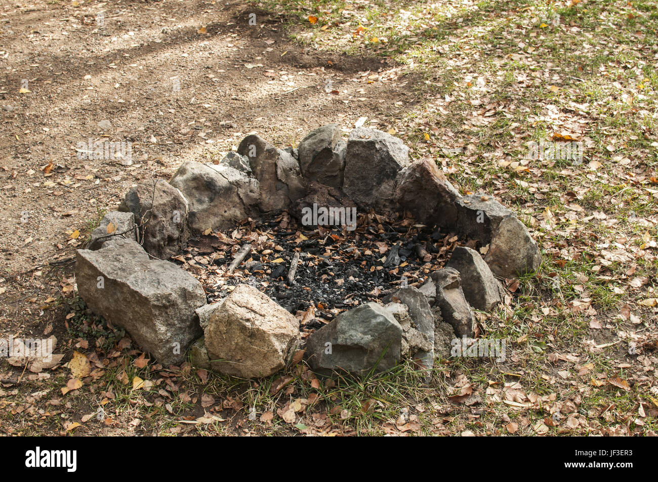 Stone open fireplace Stock Photo - Alamy