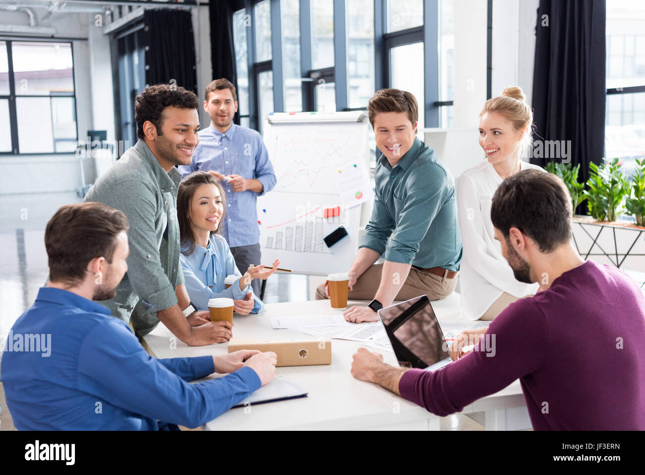 professional businesspeople discussing and brainstorming together on ...