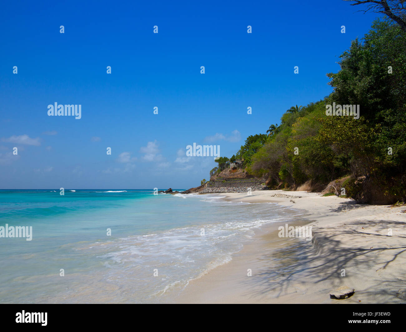 Gelliceaux Beach on Mustique is a hidden gem with azure blue water and ...