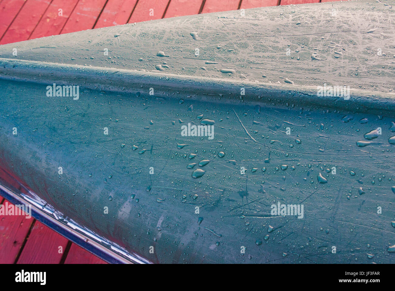 Canoes in rain at Patricia Lake, in Jasper National Park, Alberta ...