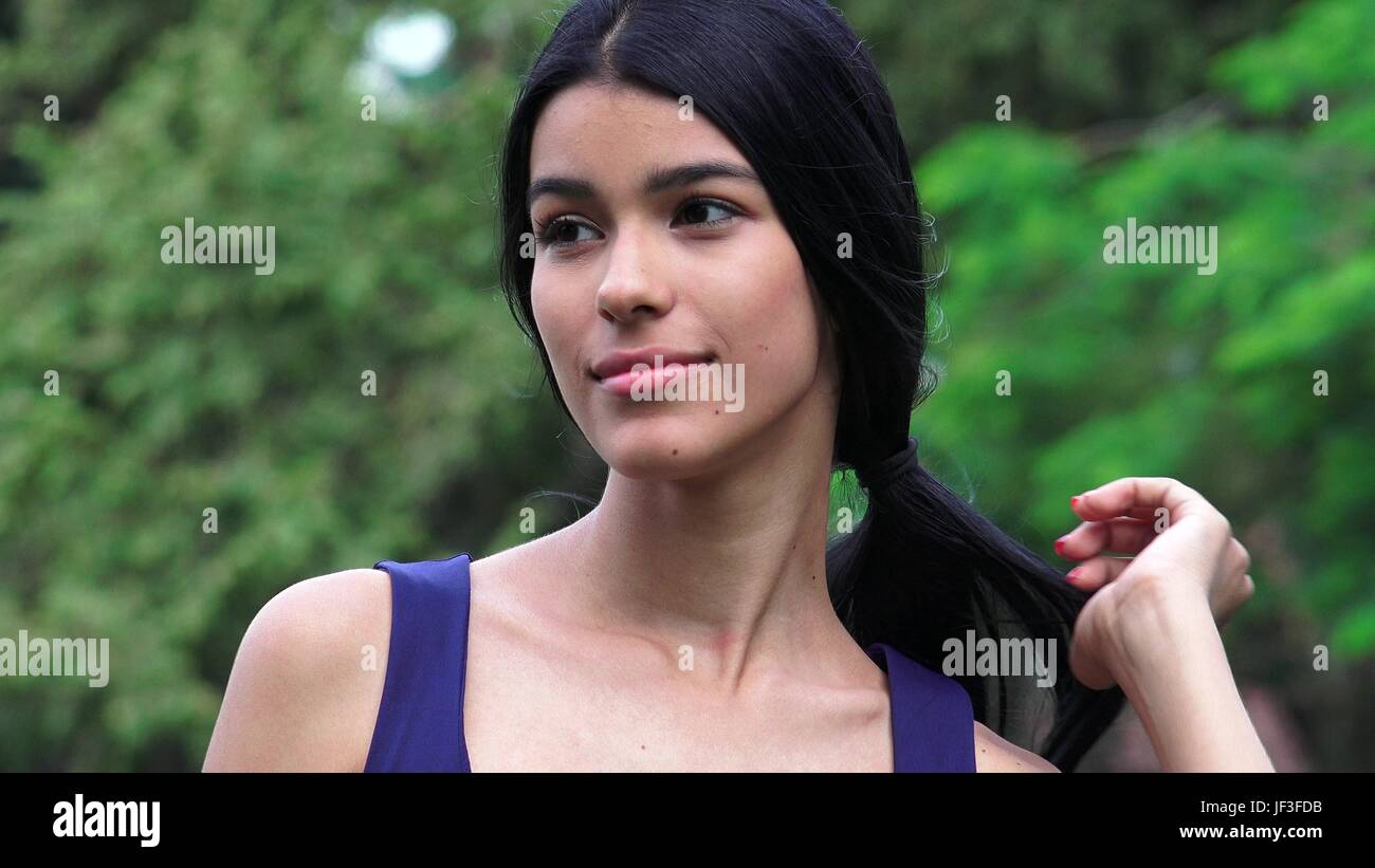 Youthful Girl And Shyness Stock Photo - Alamy