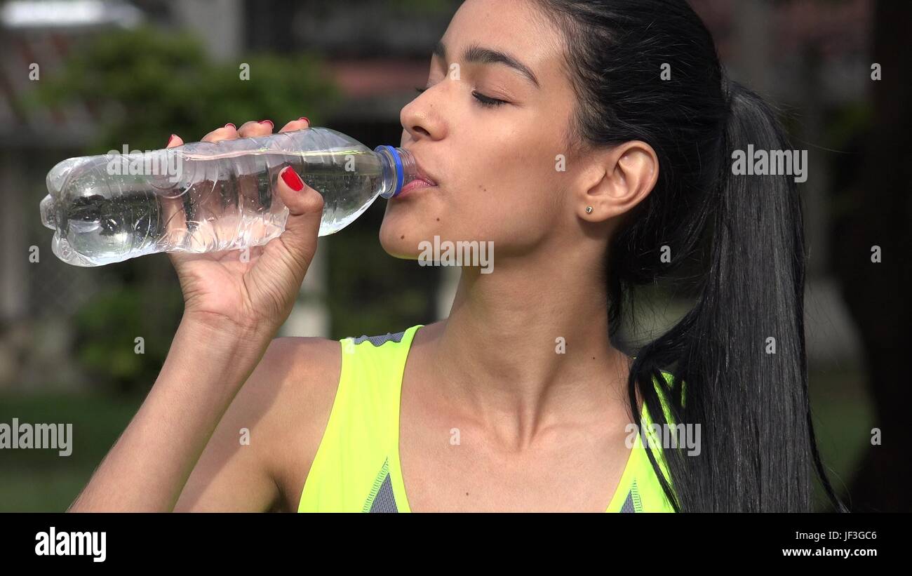 Girl Teenager Drinking Water Stock Photo - Alamy