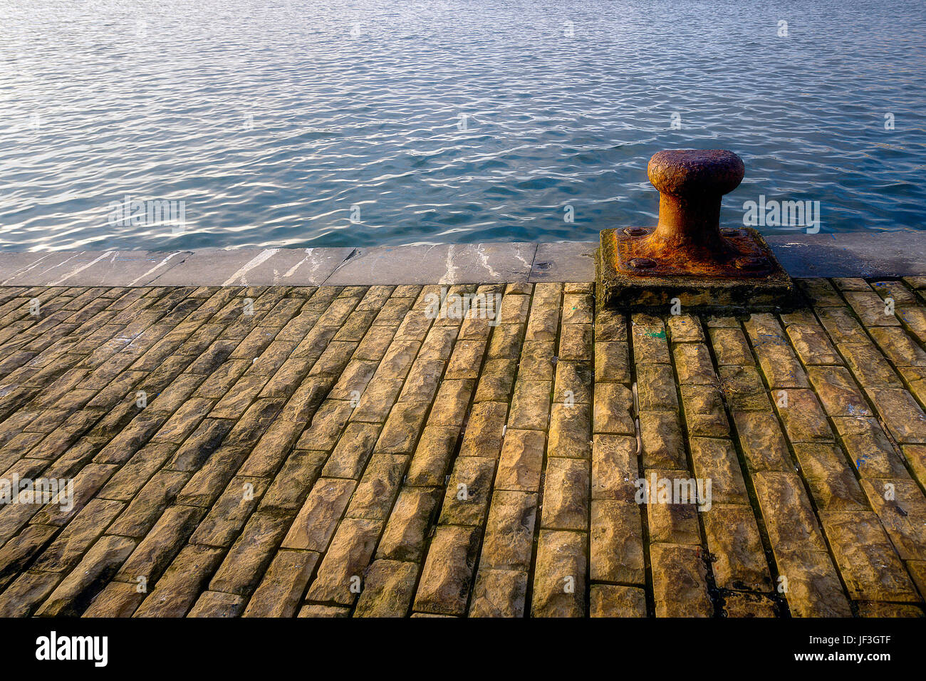 rusty port bollard Stock Photo - Alamy