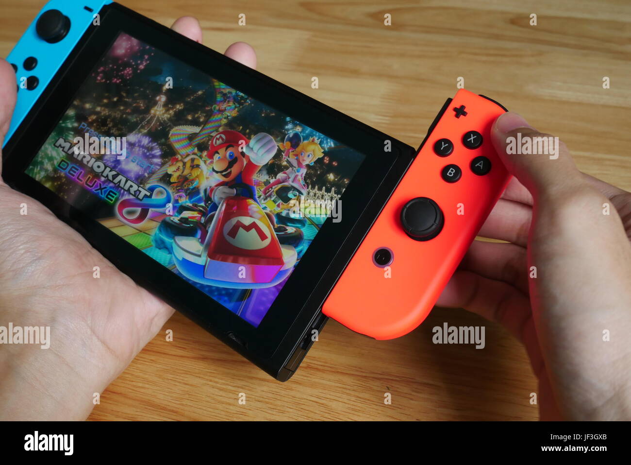 Nintendo switch joy con controller hi-res stock photography and images ...