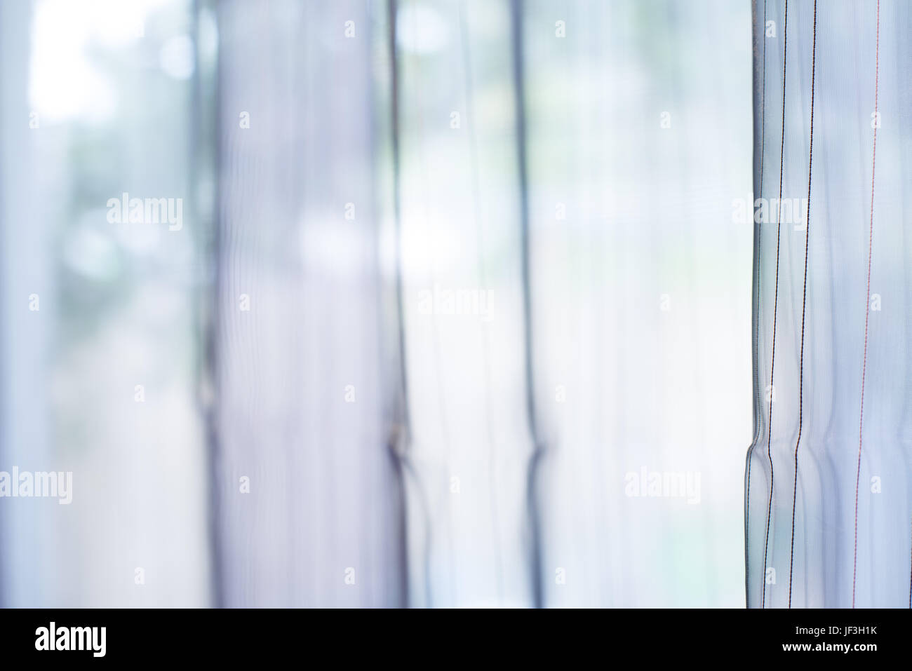 Transparent curtain on window Stock Photo - Alamy