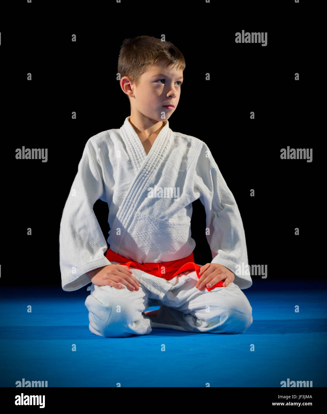 Boy martial arts fighter isolated Stock Photo - Alamy