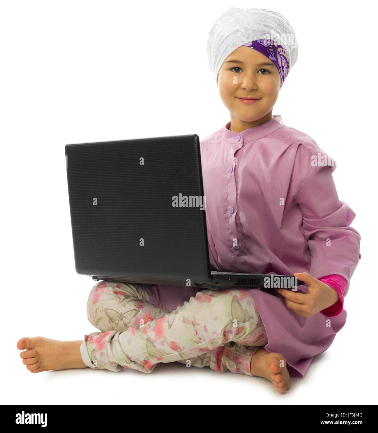 Little muslim girl isolated on white Stock Photo - Alamy