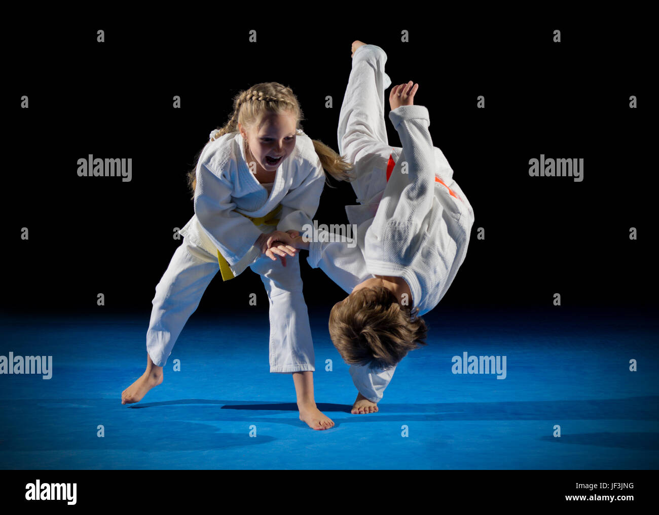 Children martial arts fighters isolated Stock Photo - Alamy