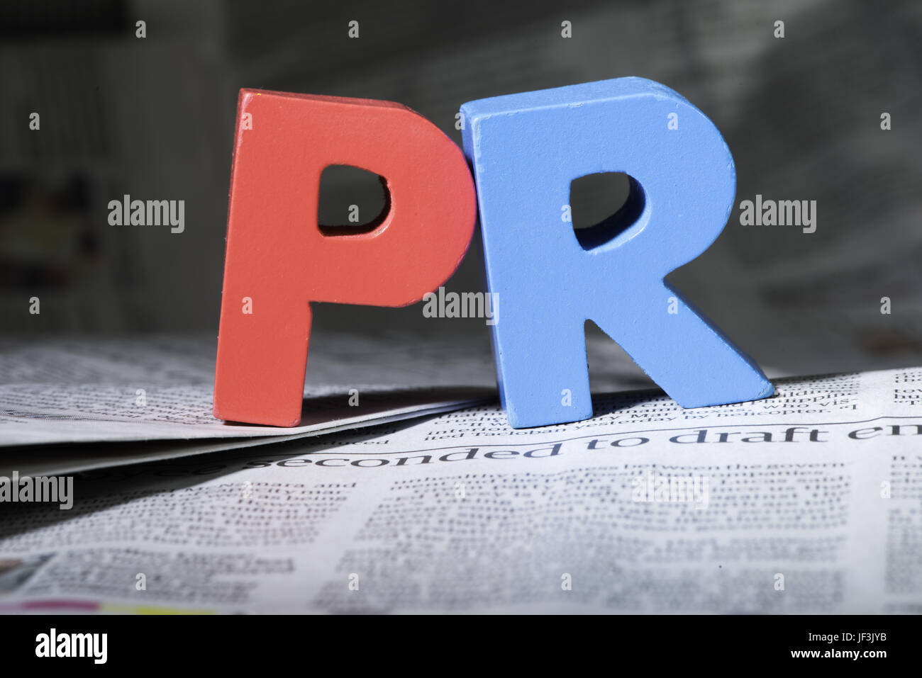 Word PR on newspaper Stock Photo - Alamy