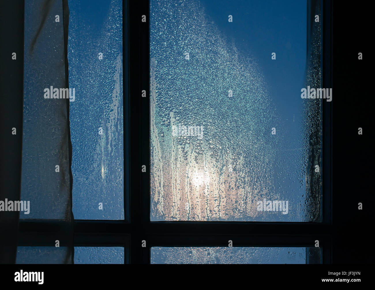 Moonlight through the window Stock Photo - Alamy
