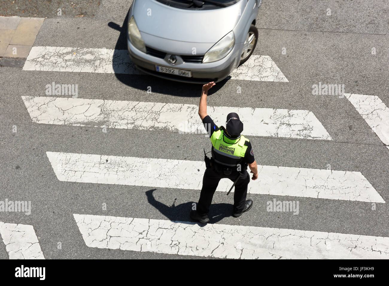 Spanish policeman controlling traffic Pamplona in Navarre region of ...