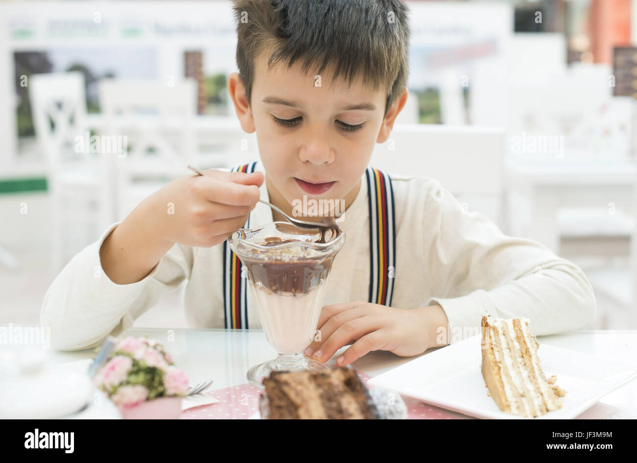 Child eat milk choco shake Stock Photo - Alamy