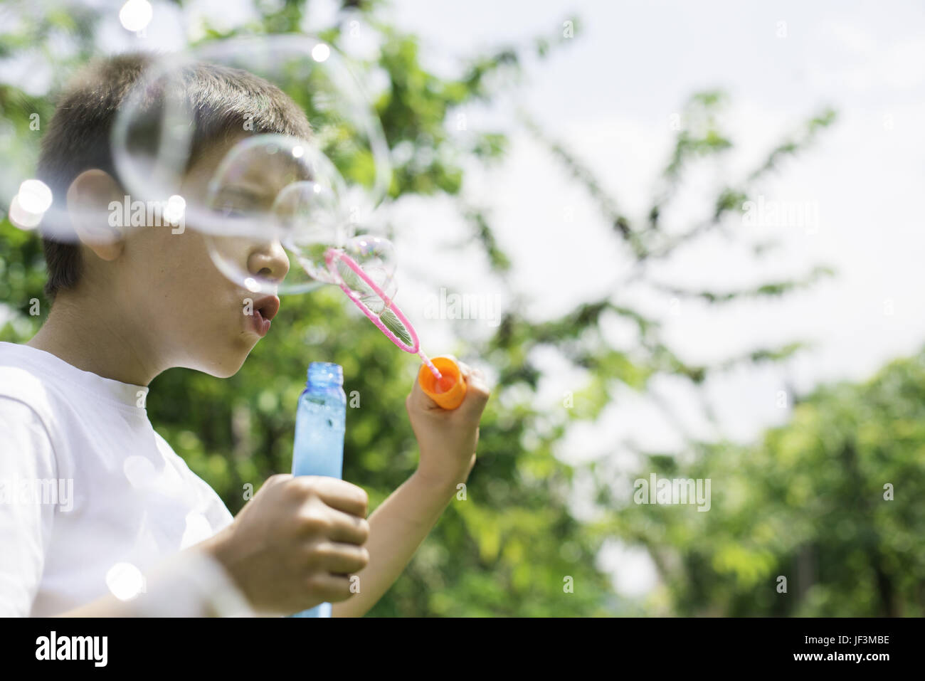 Child makes bubbles Stock Photo - Alamy