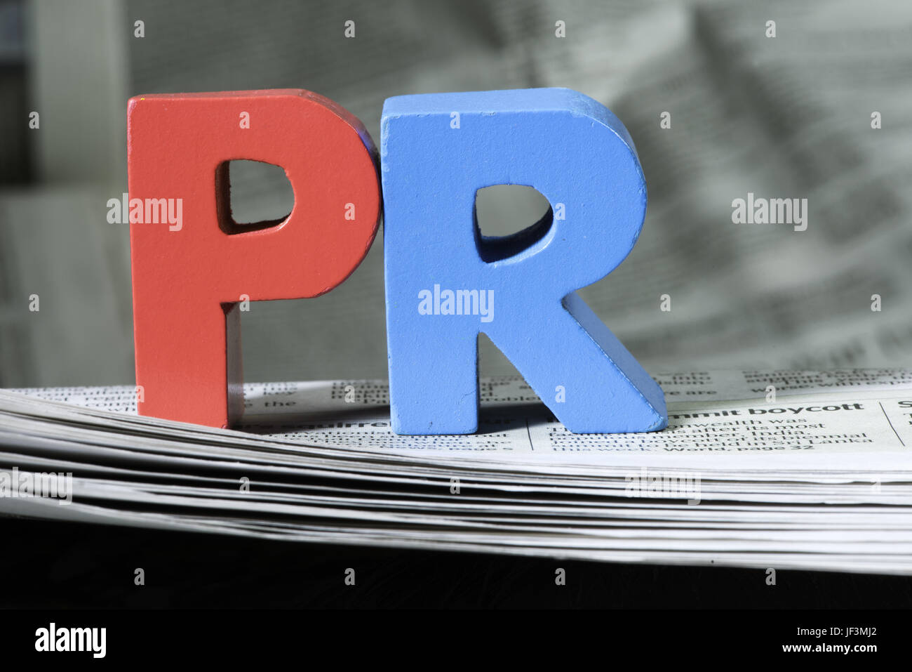 Word PR on newspaper Stock Photo - Alamy