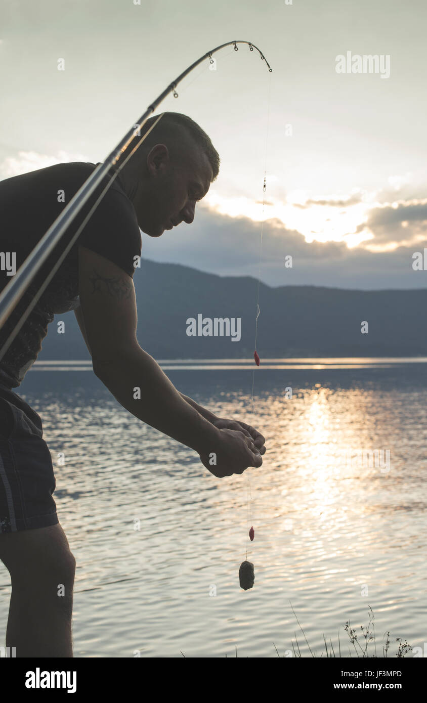 Man with a rod hi-res stock photography and images - Alamy