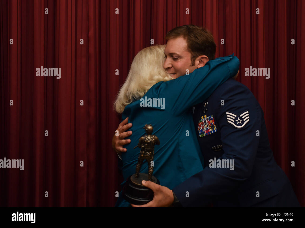 Linda Ammons, Tech. Sgt. Timothy Officer Jr’s mother, hugs Staff Sgt ...