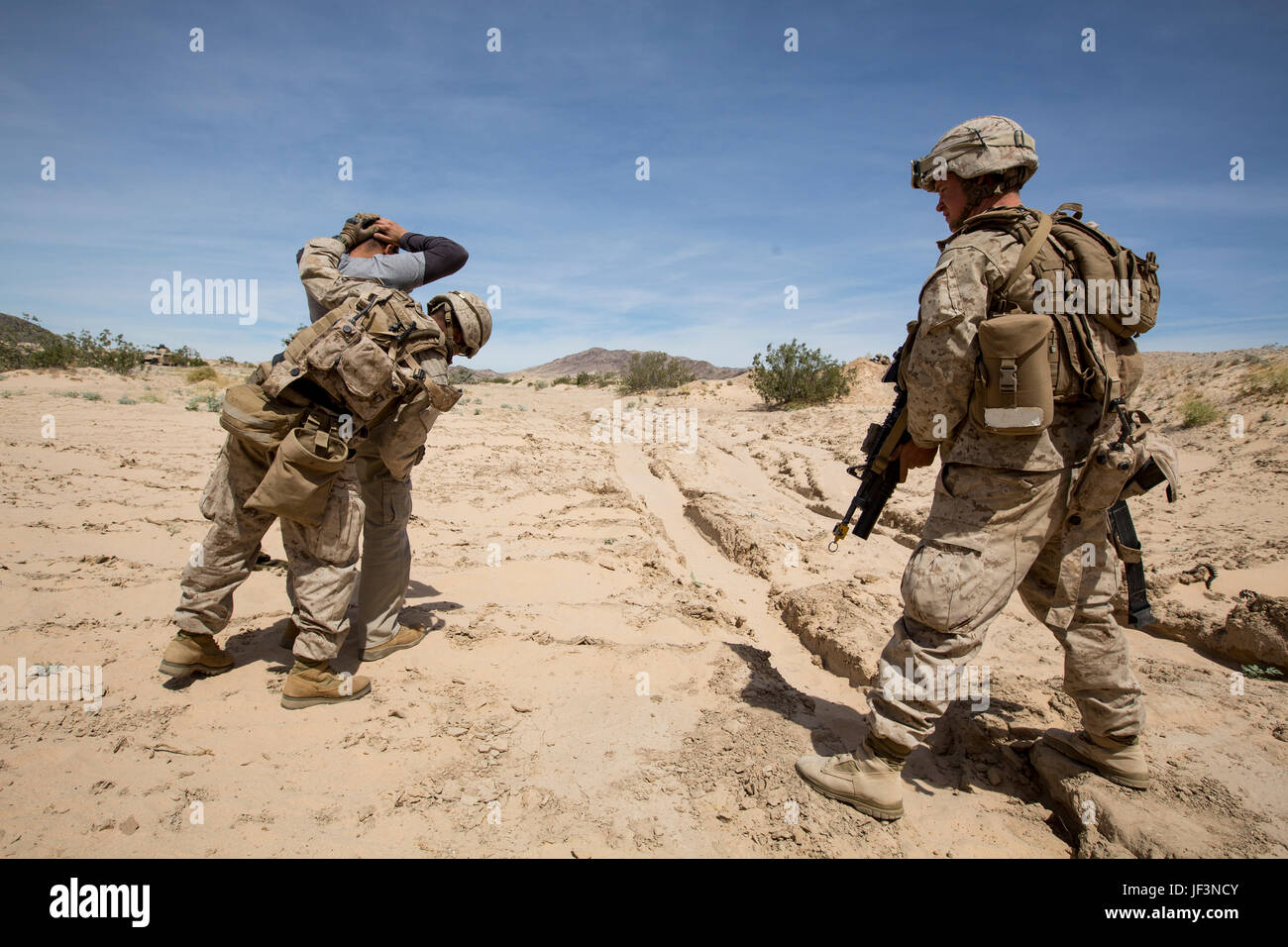 U.S. Marines conduct counter-IED training at a checkpoint during Talon ...
