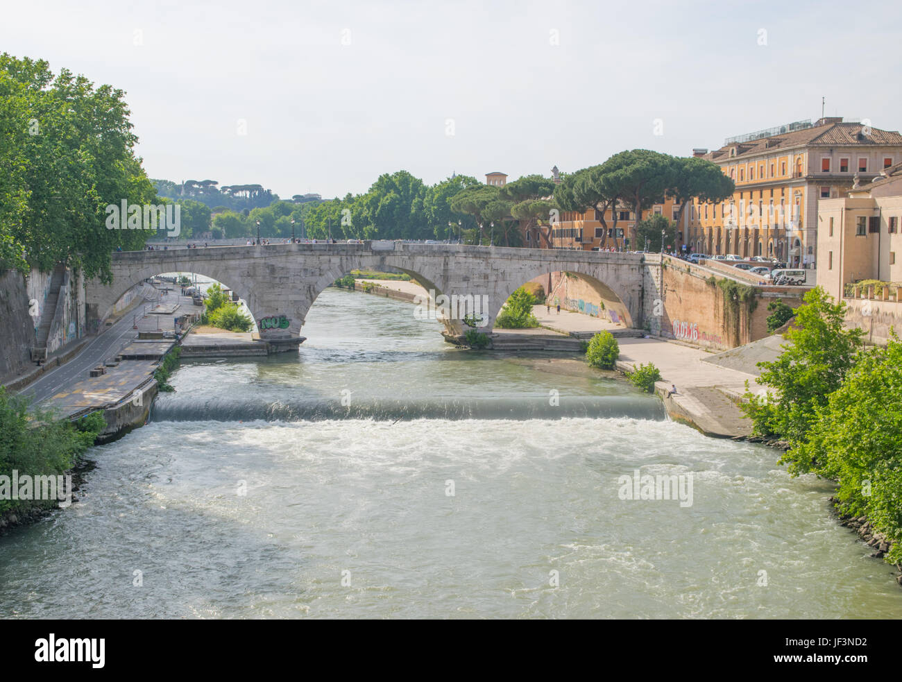 Ponte Fabricio and Isola Tiberina in Rome, Italy. Fabricius Bridge is ...