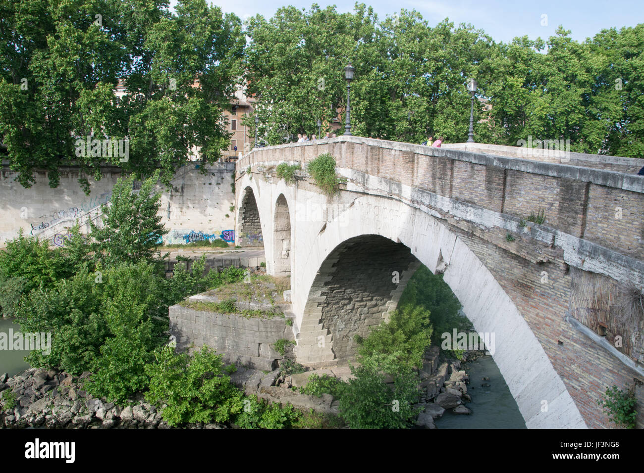 Ponte Fabricio and Isola Tiberina in Rome, Italy. Fabricius Bridge is ...