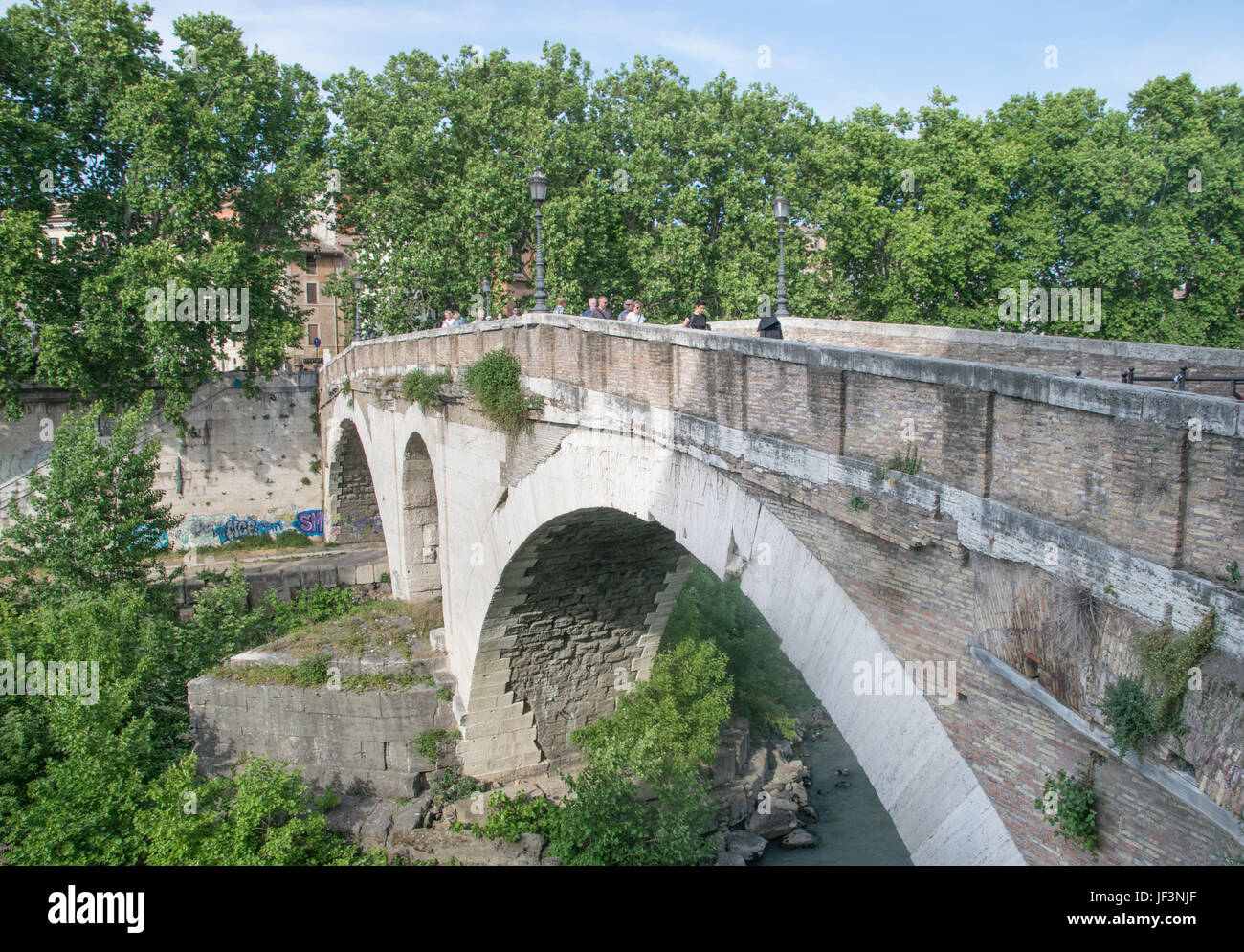Ponte Fabricio and Isola Tiberina in Rome, Italy. Fabricius Bridge is ...