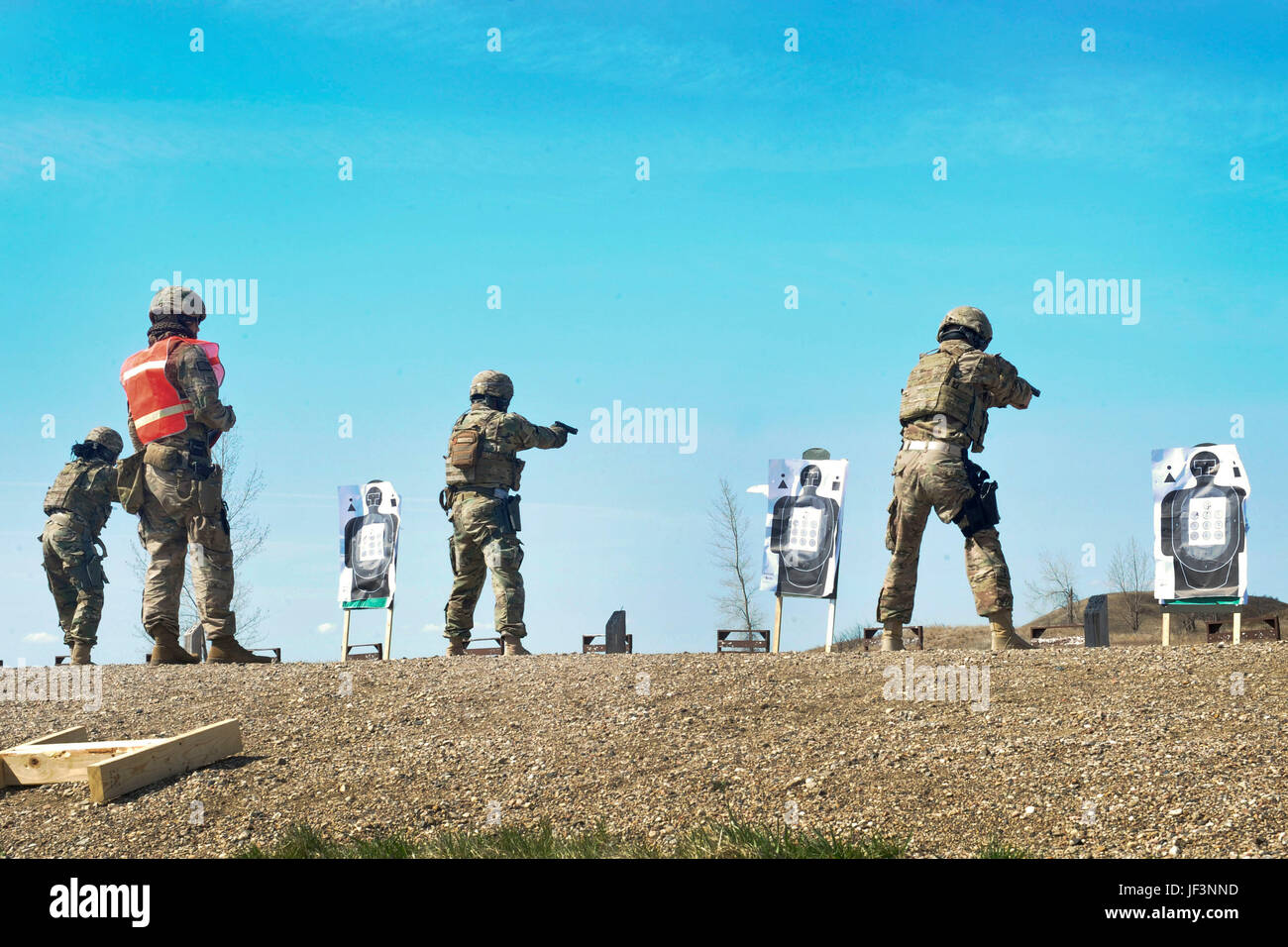 Members of the 91st Security Forces Group Global Strike Challenge fire ...