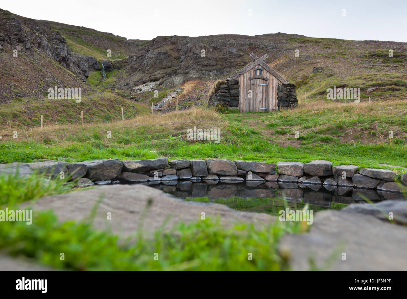 Hot spring outdoor bath in Iceland. Nordic calm nature Stock Photo - Alamy