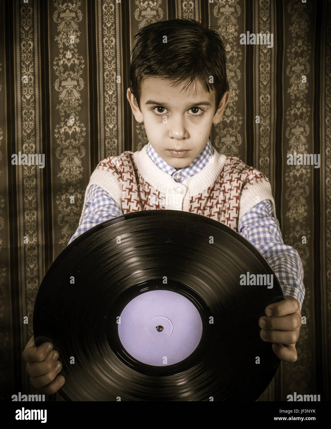 Child hold lp Stock Photo - Alamy