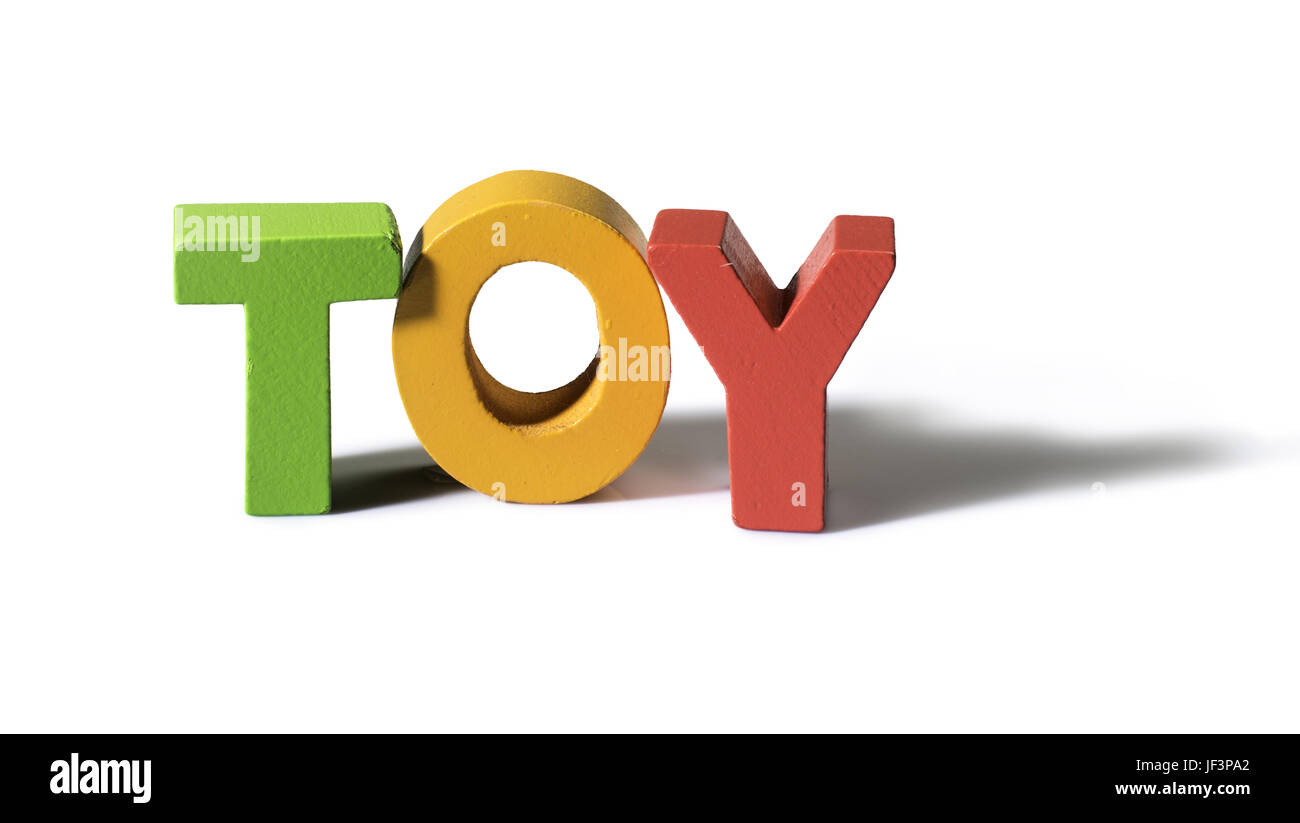 Multicolored text toy made of wood Stock Photo - Alamy