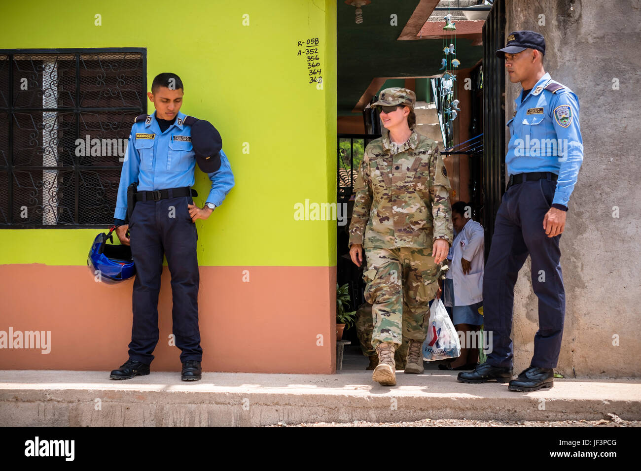 U.S. Army Lt. Col. Rhonda Dyer and U.S. Army Spc. Jeriel Hernandez ...
