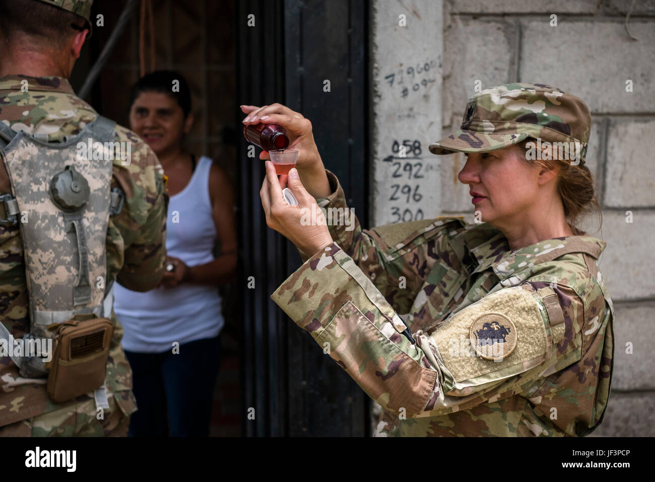 U.S. Army Lt. Col. Rhonda Dyer, Joint Task Force - Bravo, measures out ...