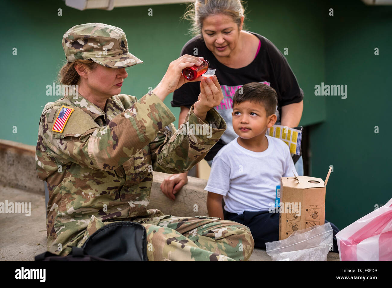 U.S. Army Lt. Col. Rhonda Dyer, Joint Task Force - Bravo, measures out ...