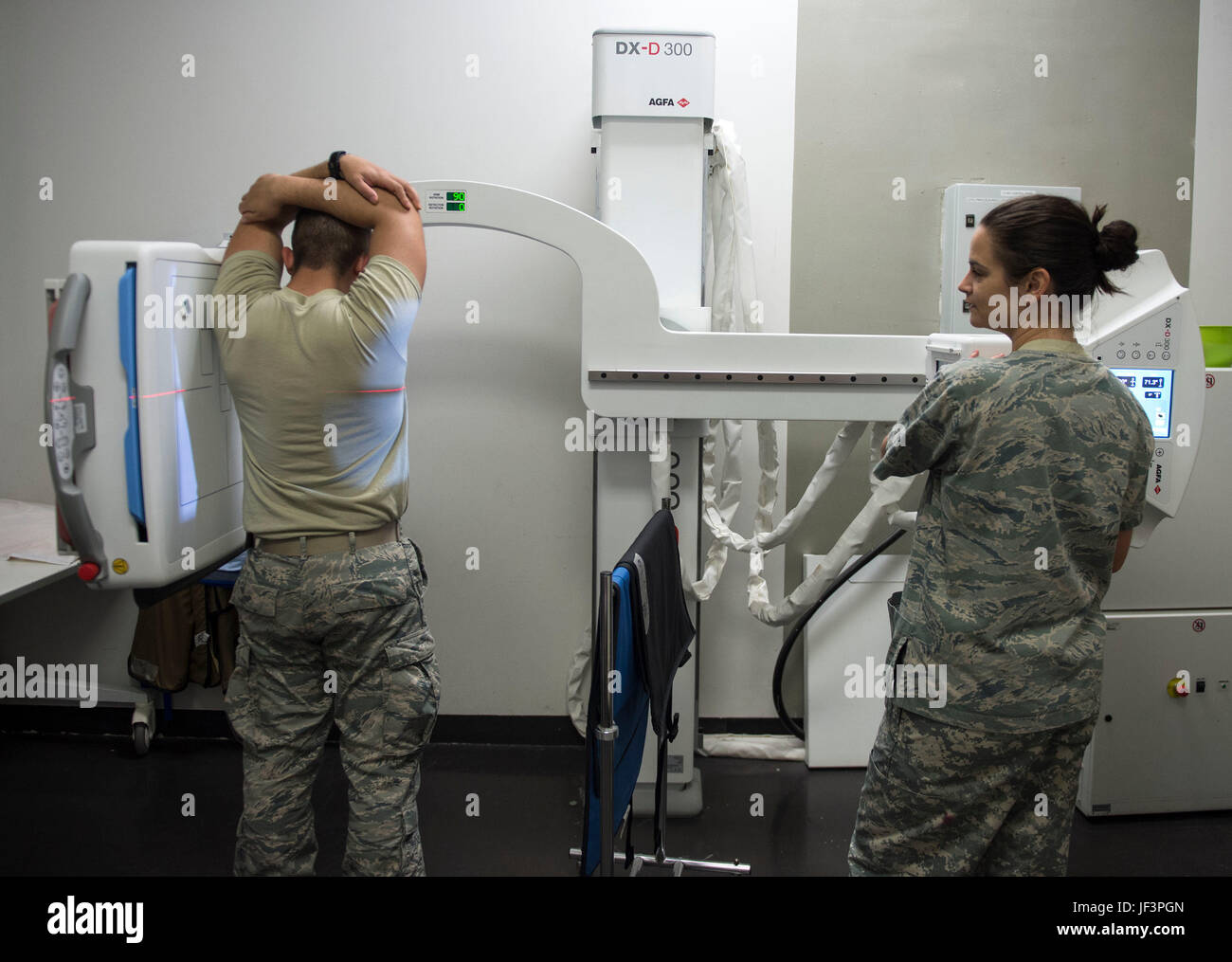U.S. Air Force Staff Sgt. Jessica Corley, right, an x-ray and ...