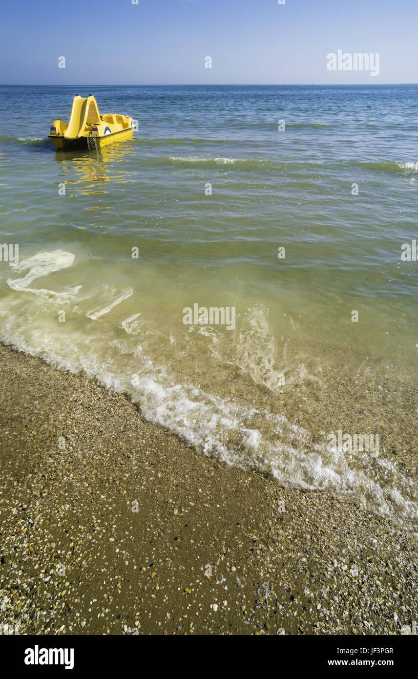 Yellow lifeboat on the beach Stock Photo - Alamy