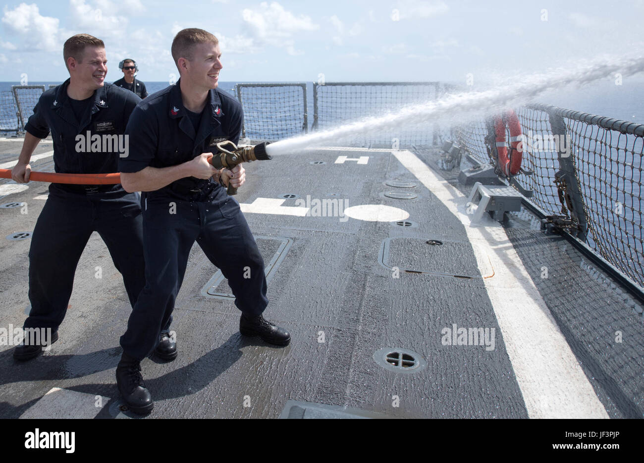 Fire hose handling hi-res stock photography and images - Alamy