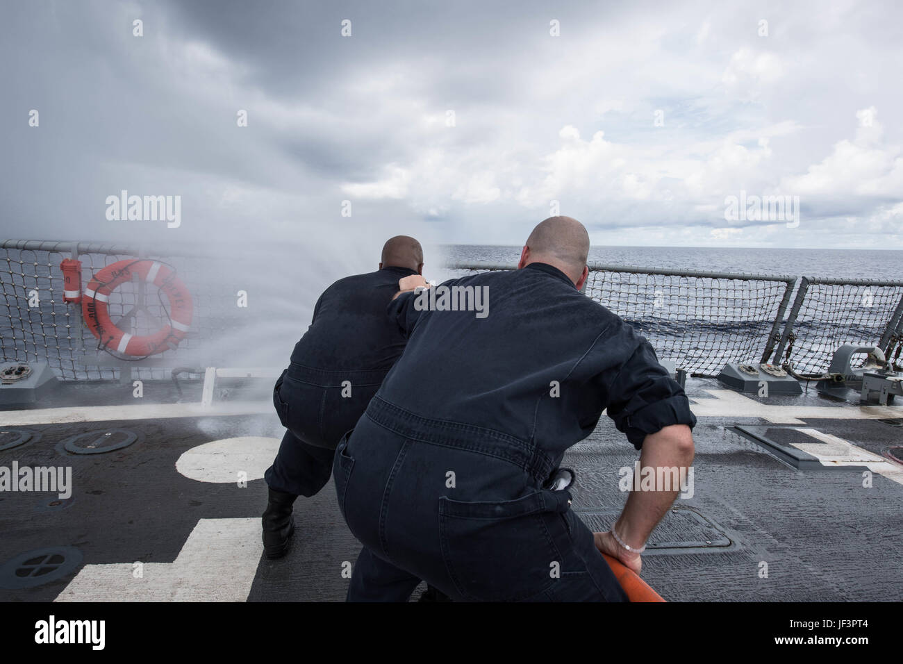 Fire hose handling techniques hi-res stock photography and images - Alamy