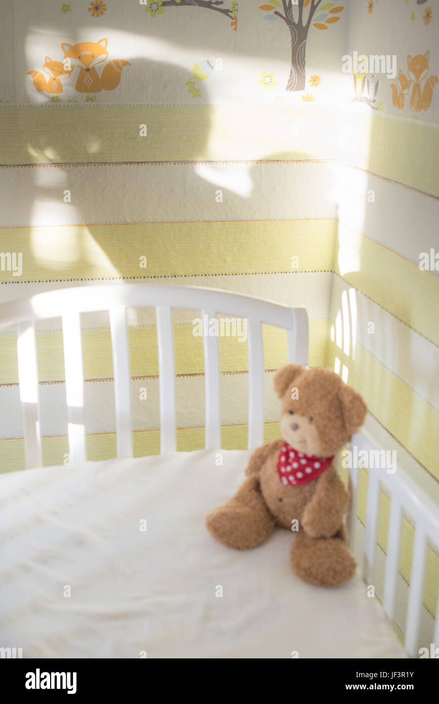 Teddy bear in a baby room Stock Photo - Alamy