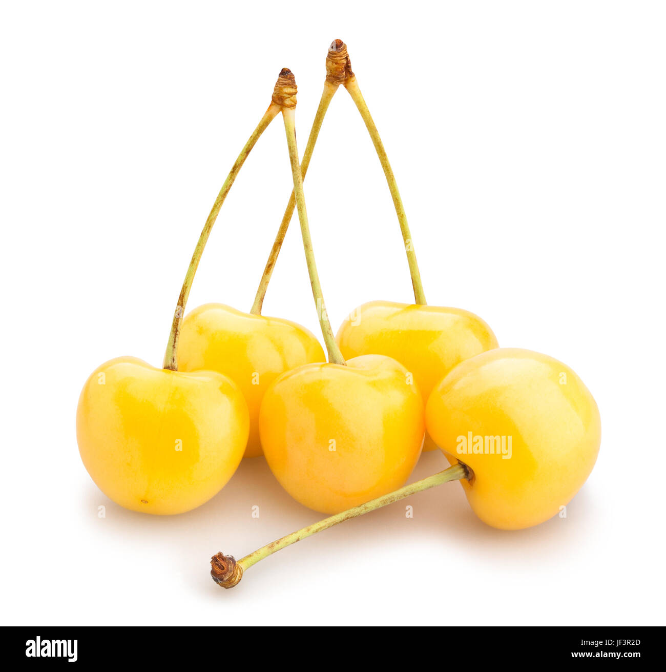 yellow cherry isolated Stock Photo - Alamy