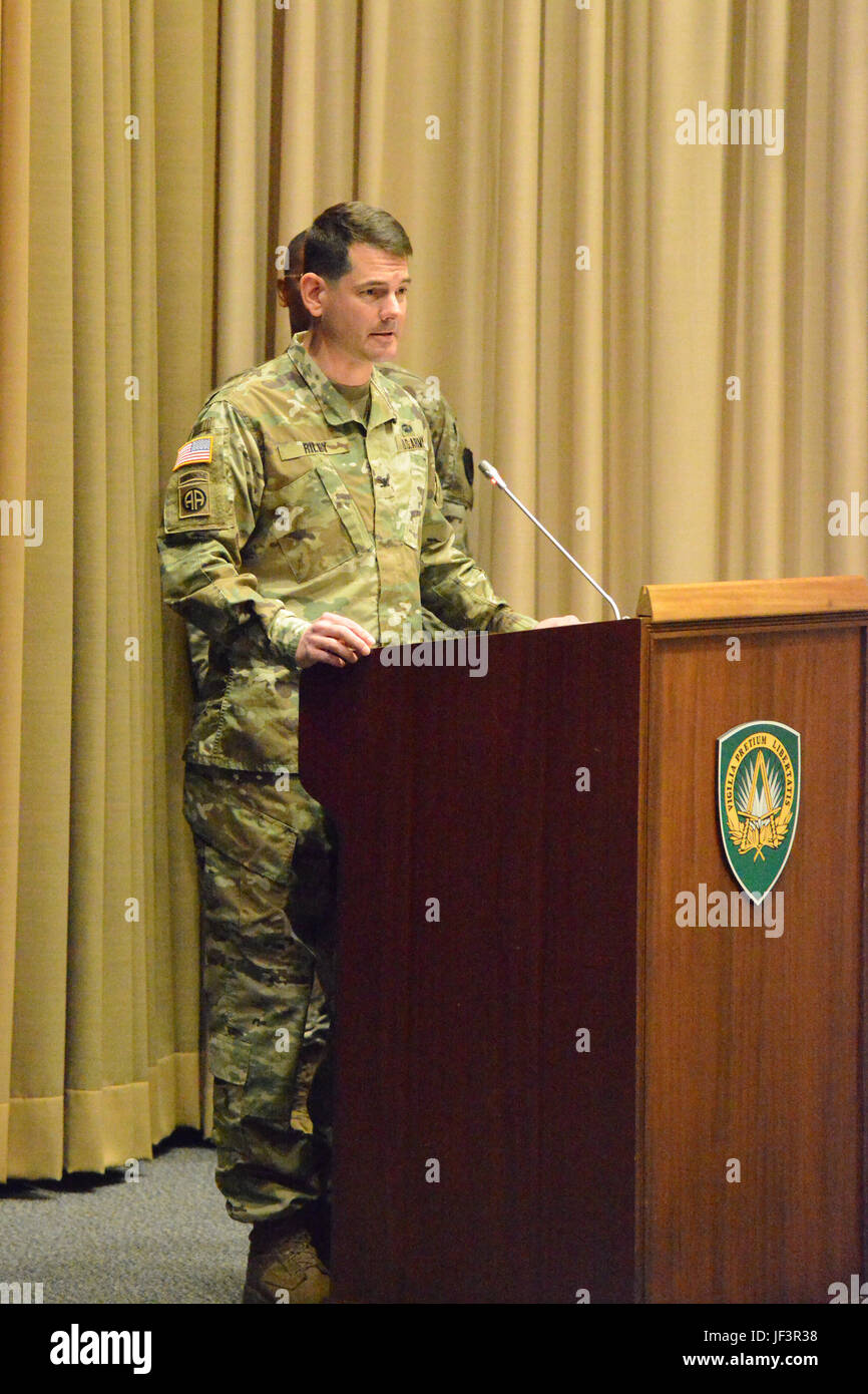 U.S. Army Col. Jason G. Riley (Reviewing Officer), gives the remarks ...