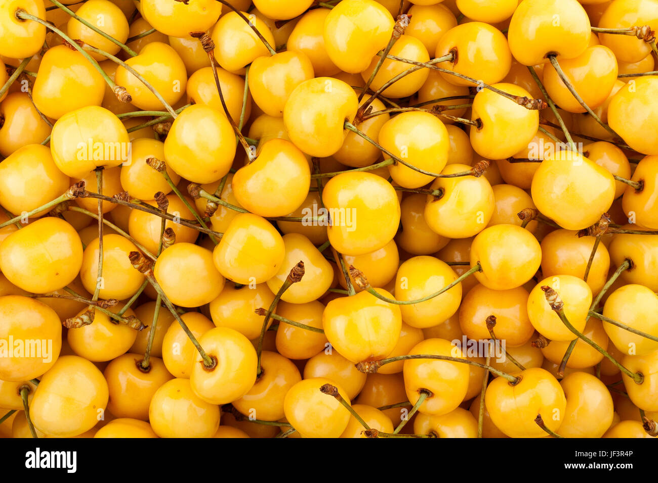yellow cherry texture Stock Photo - Alamy