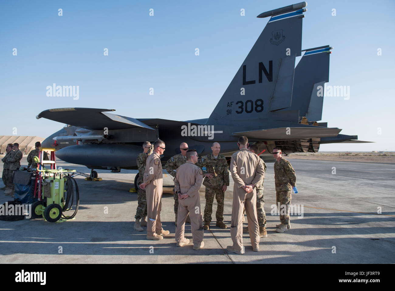 Gen. Mike Holmes, commander of Air Combat Command, speaks with 332nd ...