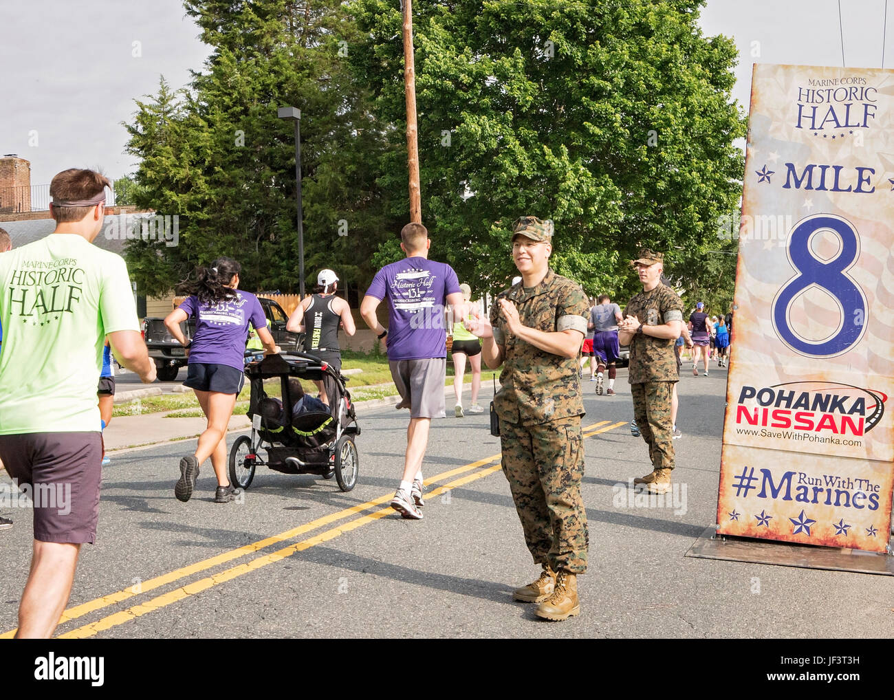 U.S. Marines cheer on runners during the 10th Annual Marine Corps ...